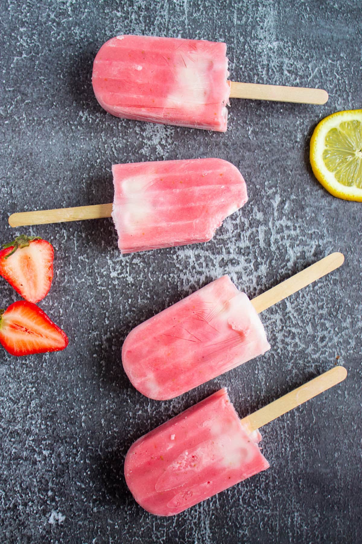 Cool and Creamy Strawberry Lemonade Popsicles Recipe | A Magical Mess